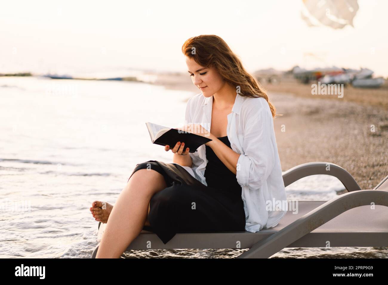 Christian woman holds bible in her hands. Reading the Holy Bible on the ...