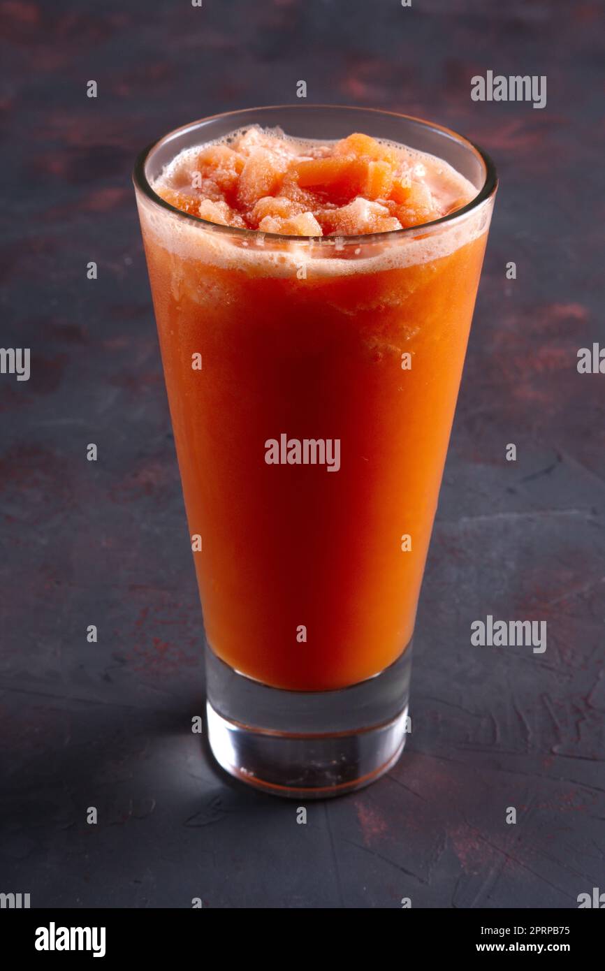Glass of carrot granizado. Crushed ice with fruit syrup beverage Stock ...