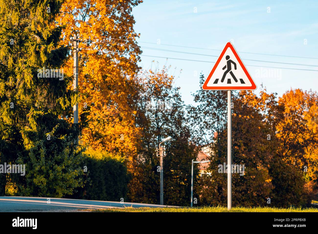 Triangle traffic sign Pedestrian Crossing. Country road and pedestrians ...