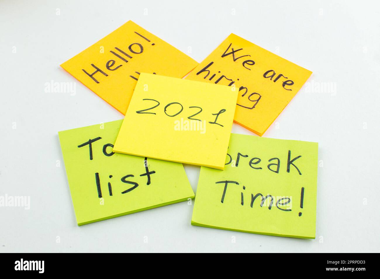 bottom view hello we are hiring break time to do list written on sticky ...