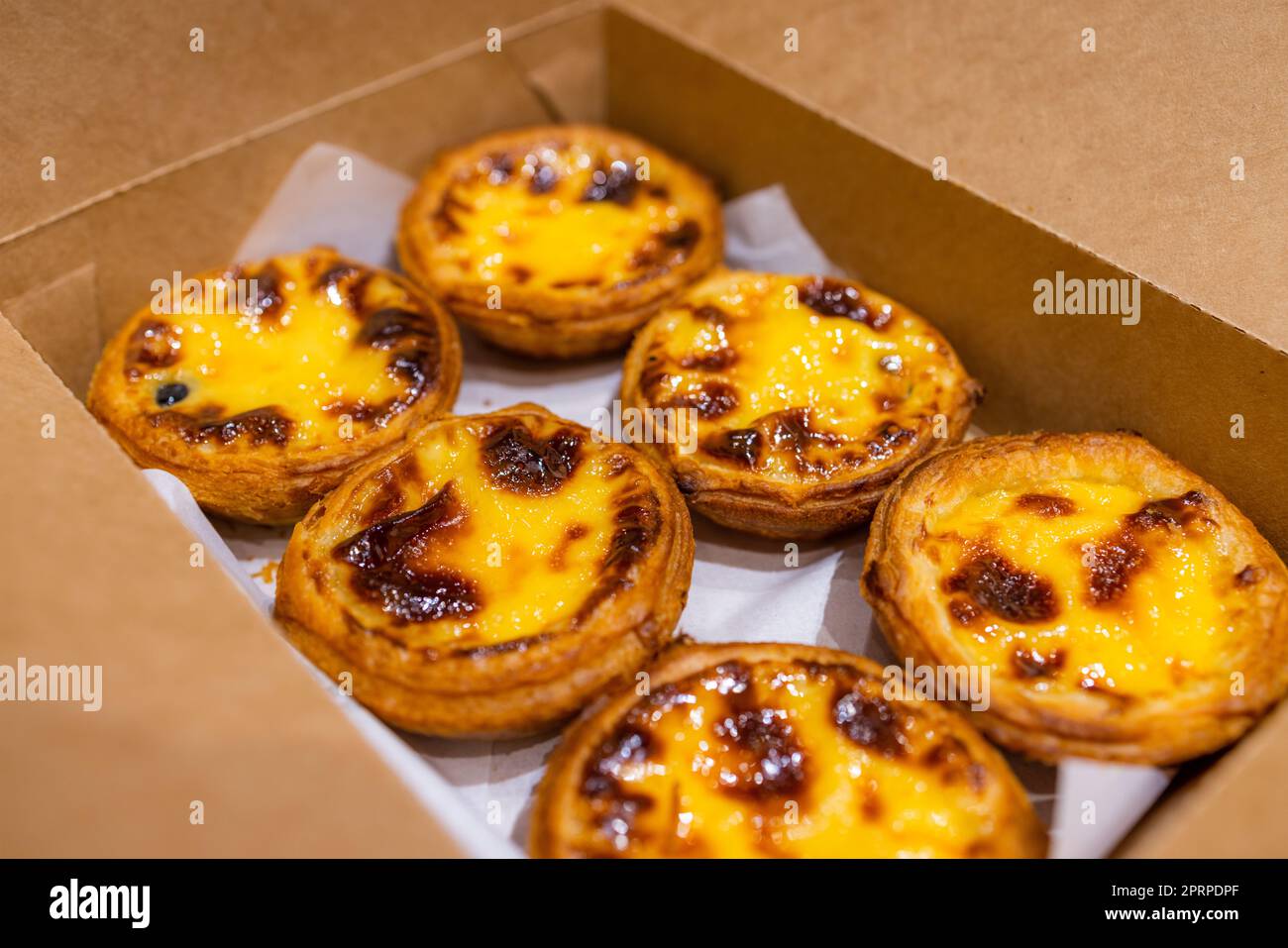 Box of portuguese egg tart Stock Photo - Alamy