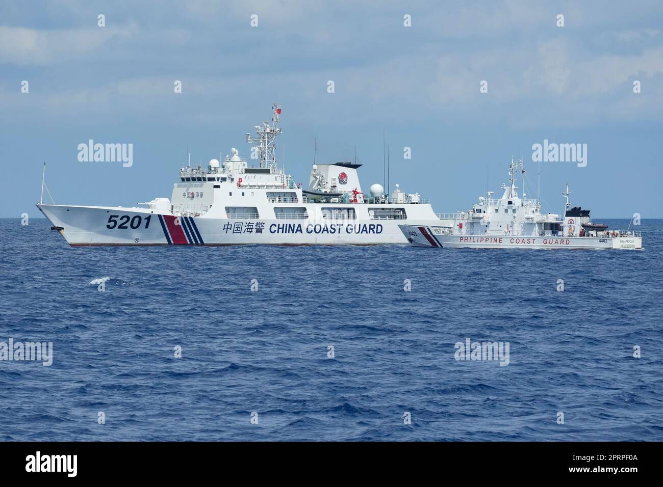 A Chinese Coast Guard ship with bow number 5201 blocks Philippine Coast ...