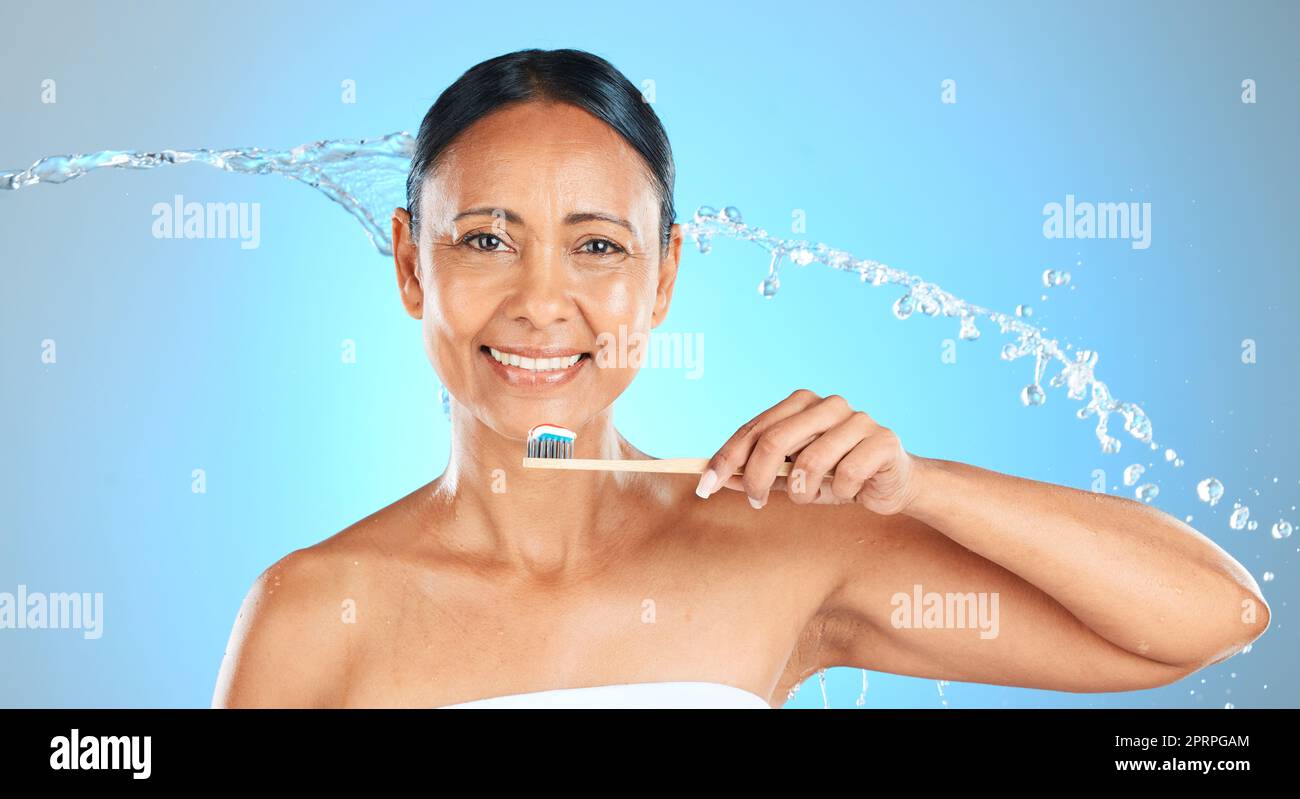 Dental, health and woman brushing teeth with toothbrush, toothpaste and ...