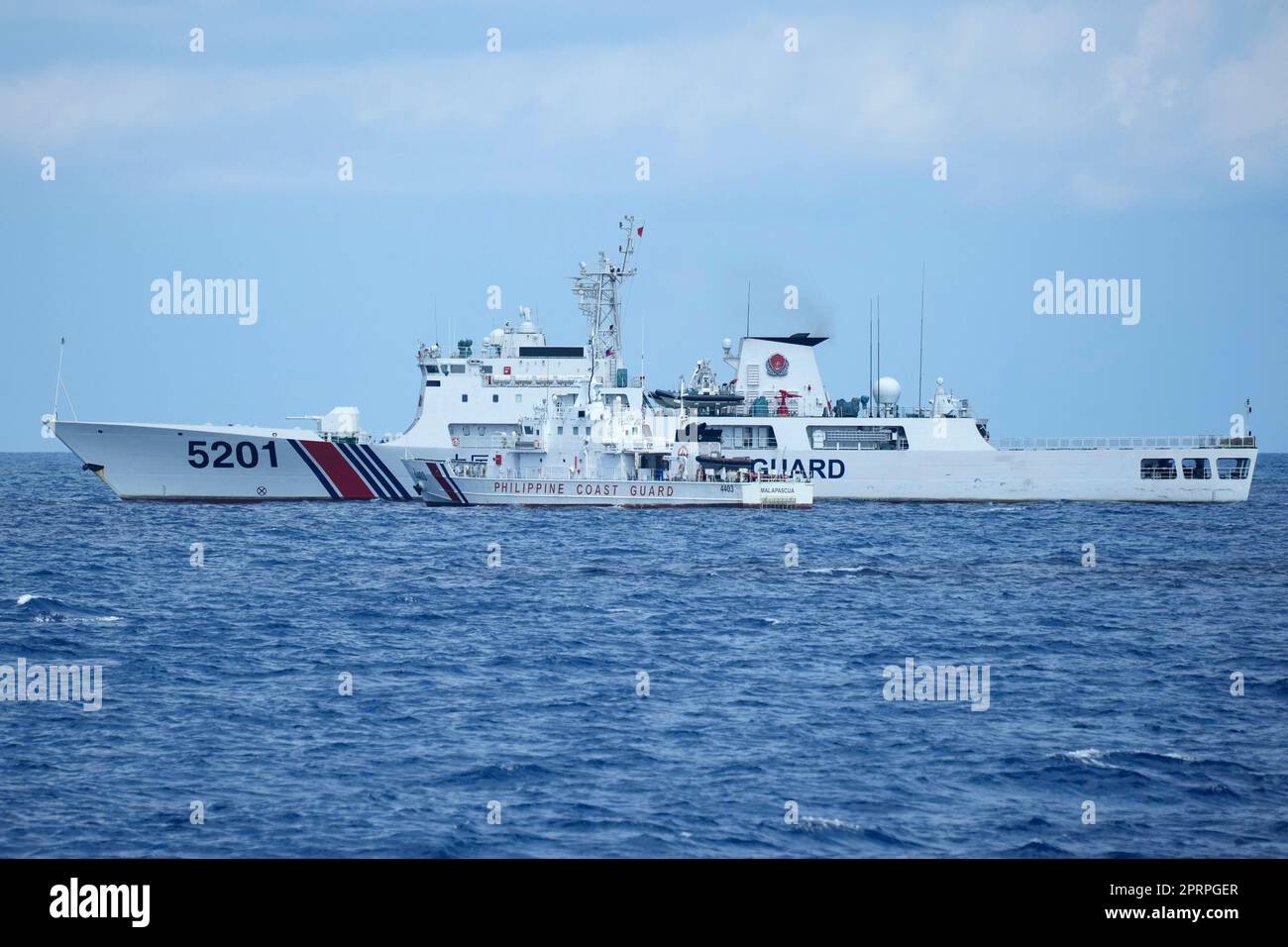 A Chinese Coast Guard ship with bow number 5201 blocks Philippine Coast ...