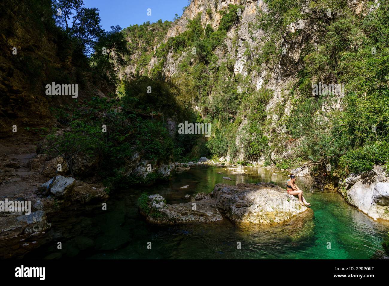 hikers bathing in the river, God's Bridge, Akchour, Talassemtane Nature ...
