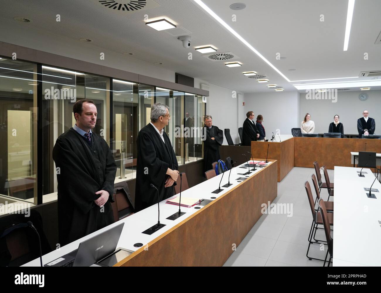 27 April 2023, Berlin: Defense attorneys Daniel Holzinger (l-r), Peter ...