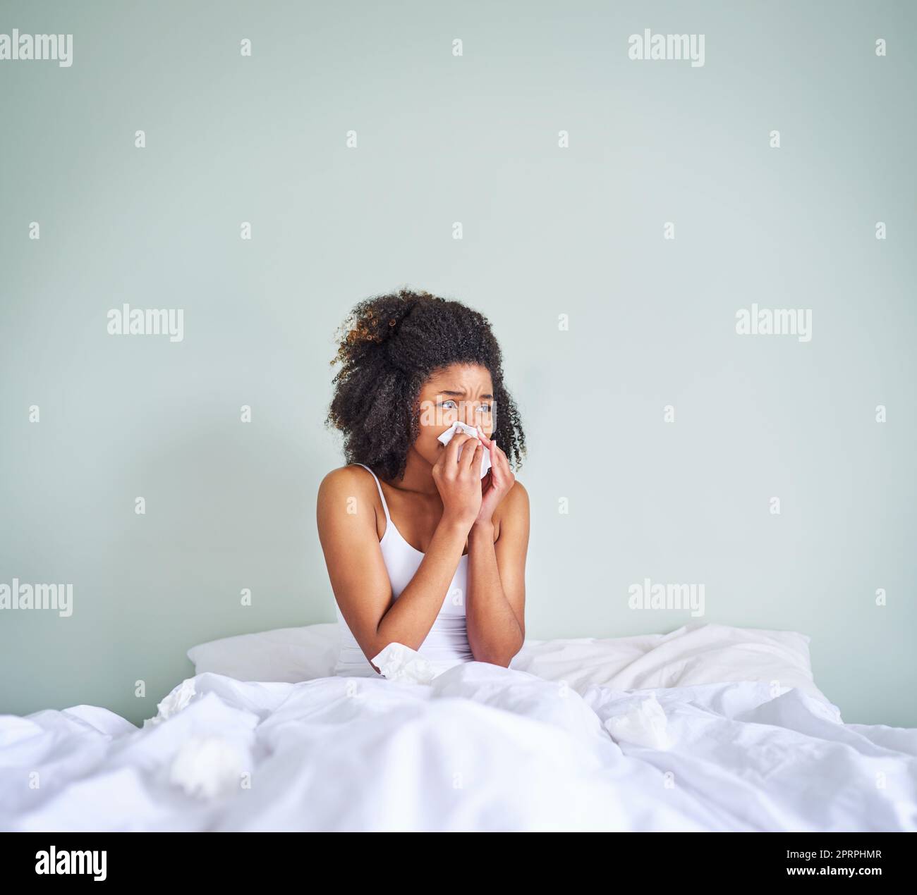 I hate getting sick when I have to go to work. a uncomfortable looking ...