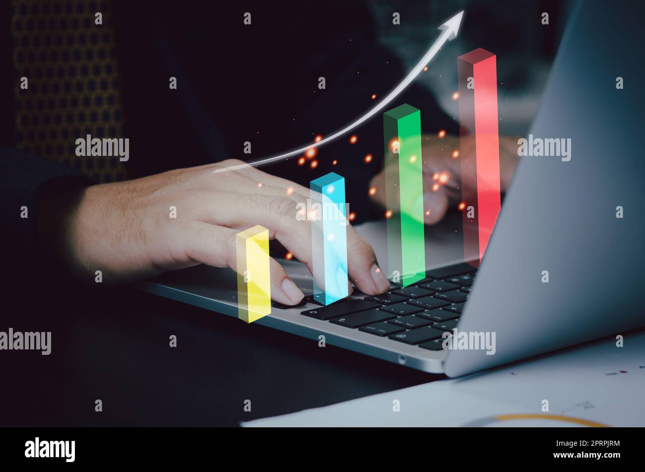Graph and arrow virtual screen with computer laptop on desk. Business ...