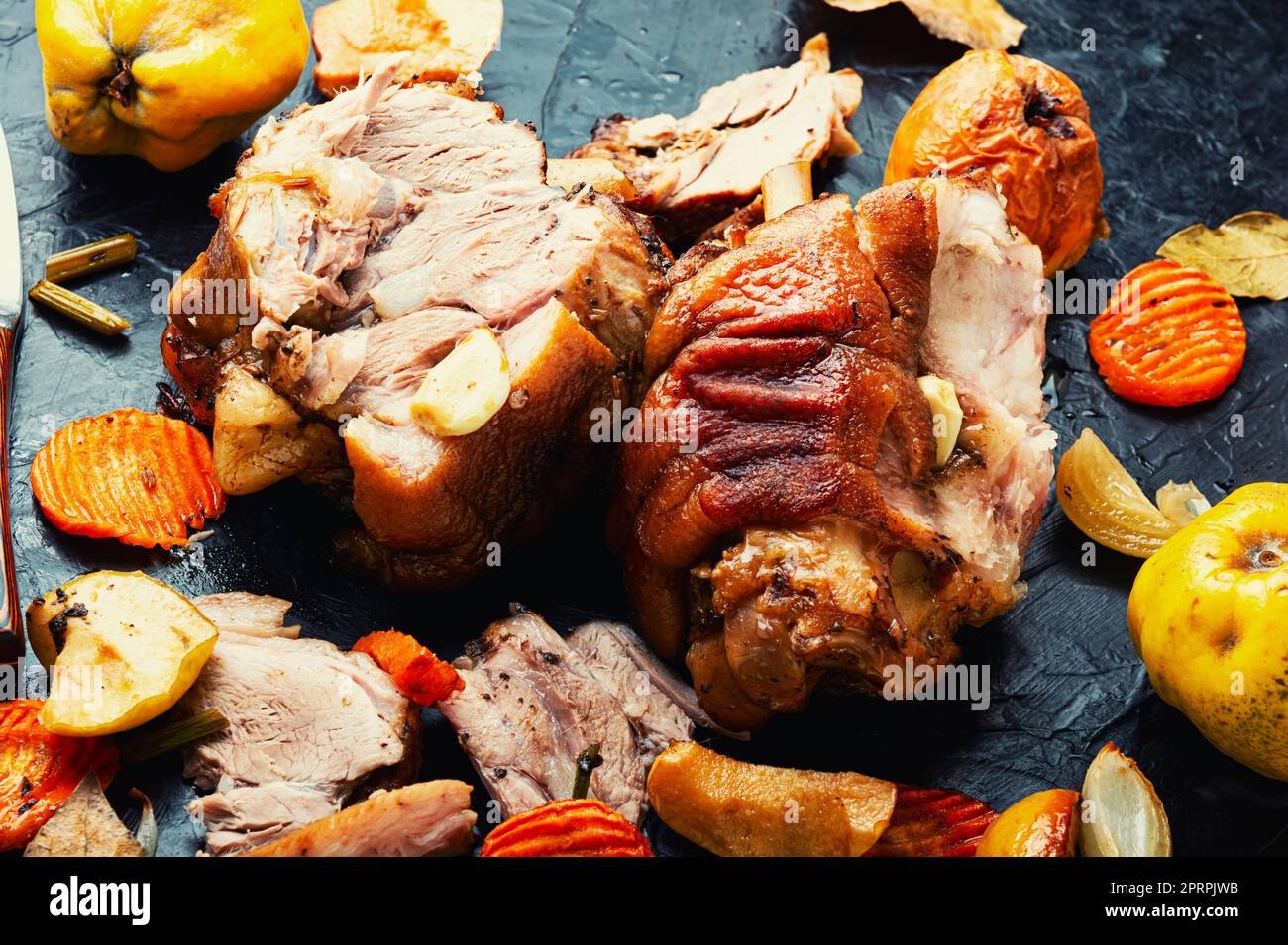 Baked meat with autumn fruits Stock Photo - Alamy