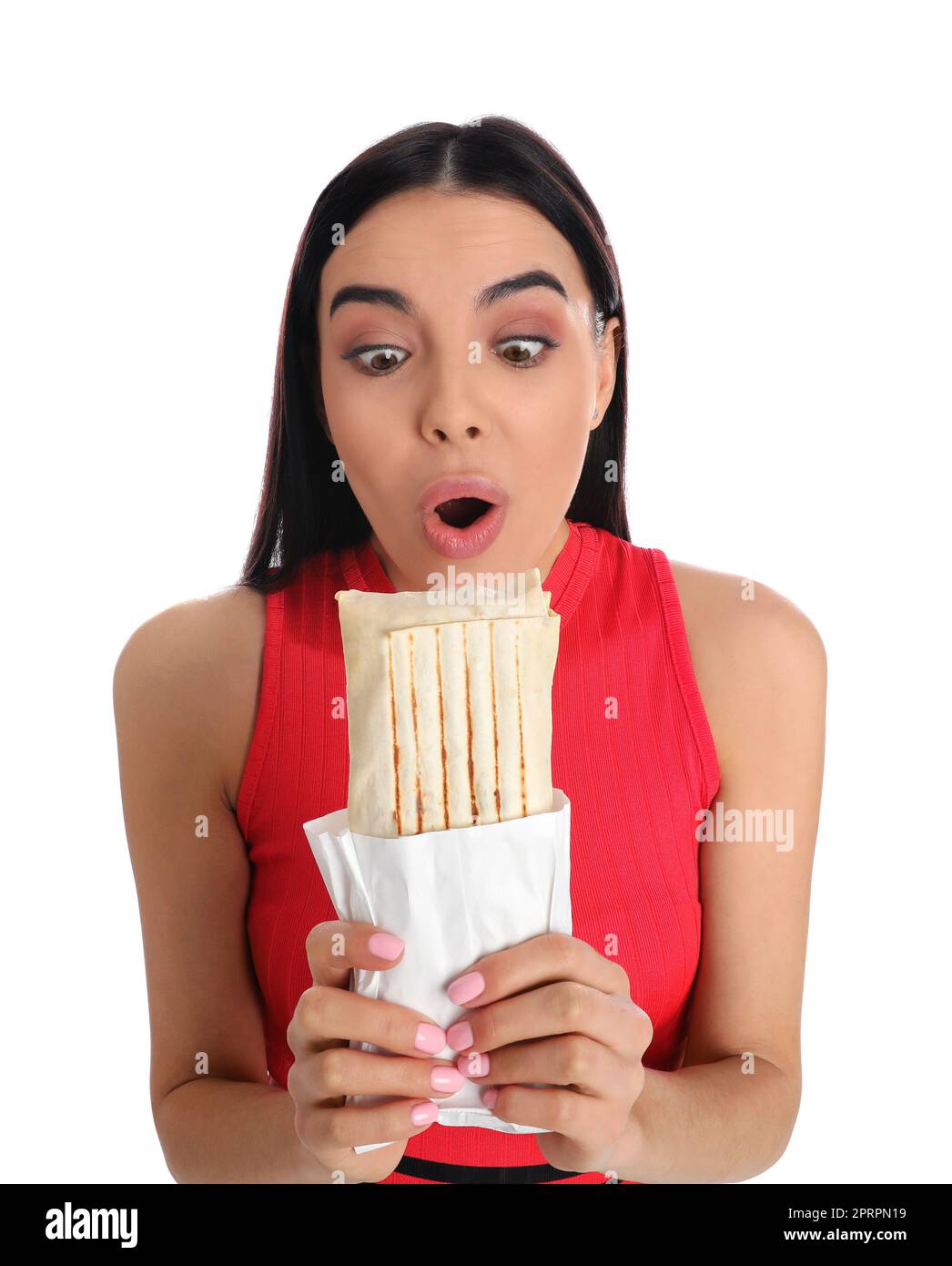 Emotional young woman with delicious shawarma on white background Stock ...