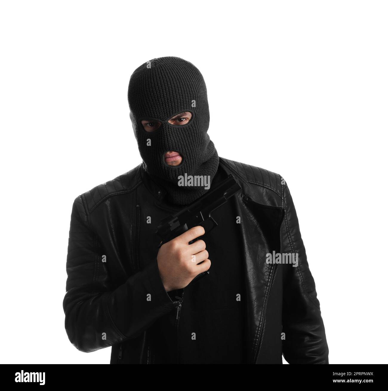 Man wearing knitted balaclava with gun on white background Stock Photo ...