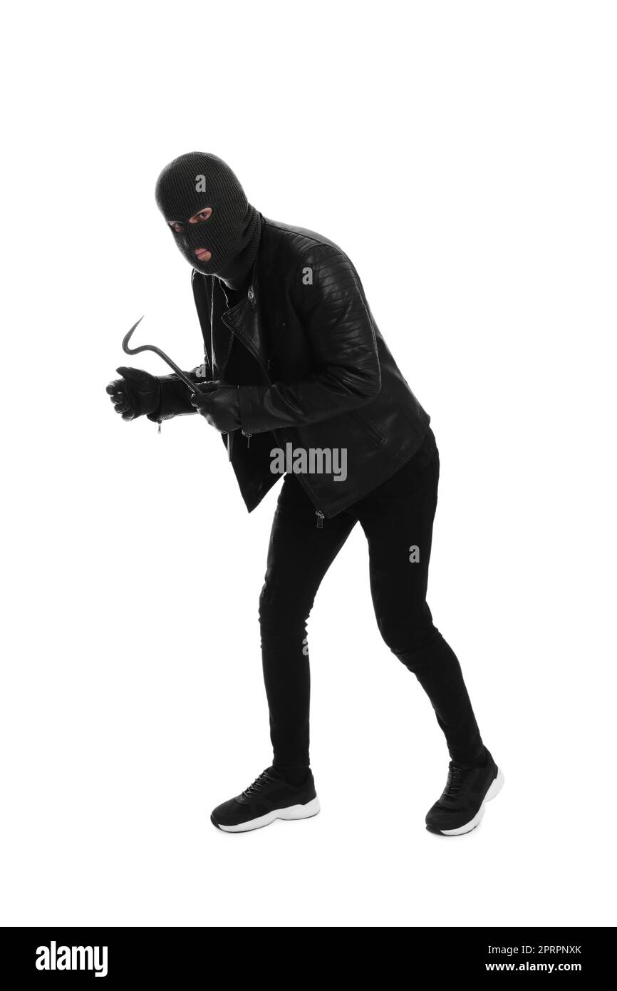 Man wearing knitted balaclava with crowbar on white background Stock ...
