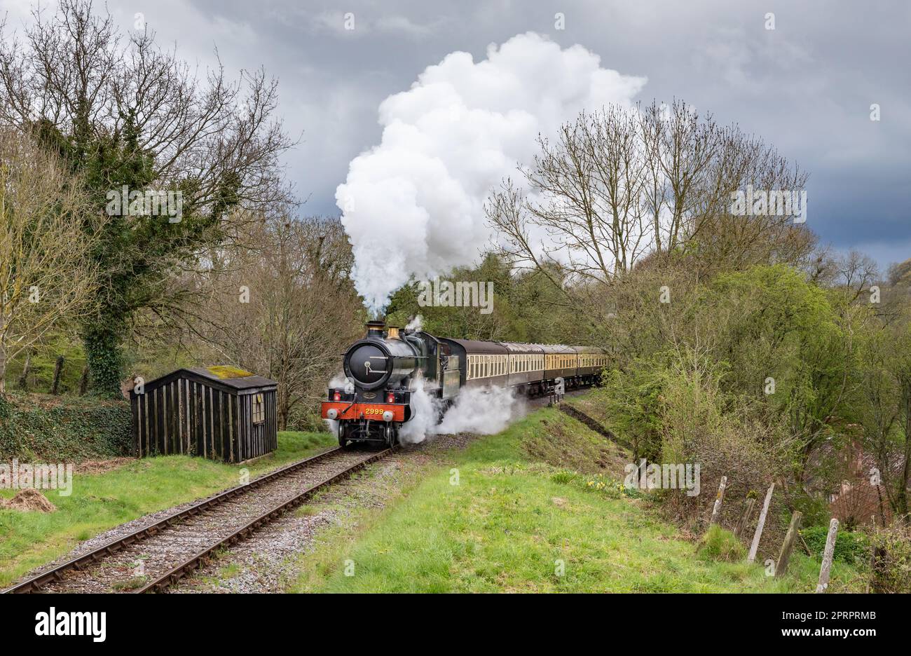 Saint Class steam locomotive Lady of Legend on and express train in ...