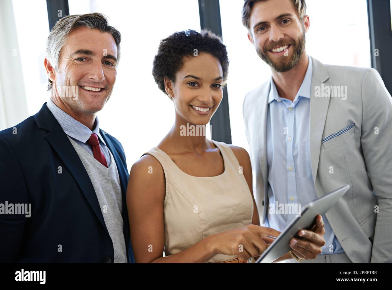 The experts you want on your side. Portrait of a group of coworkers ...