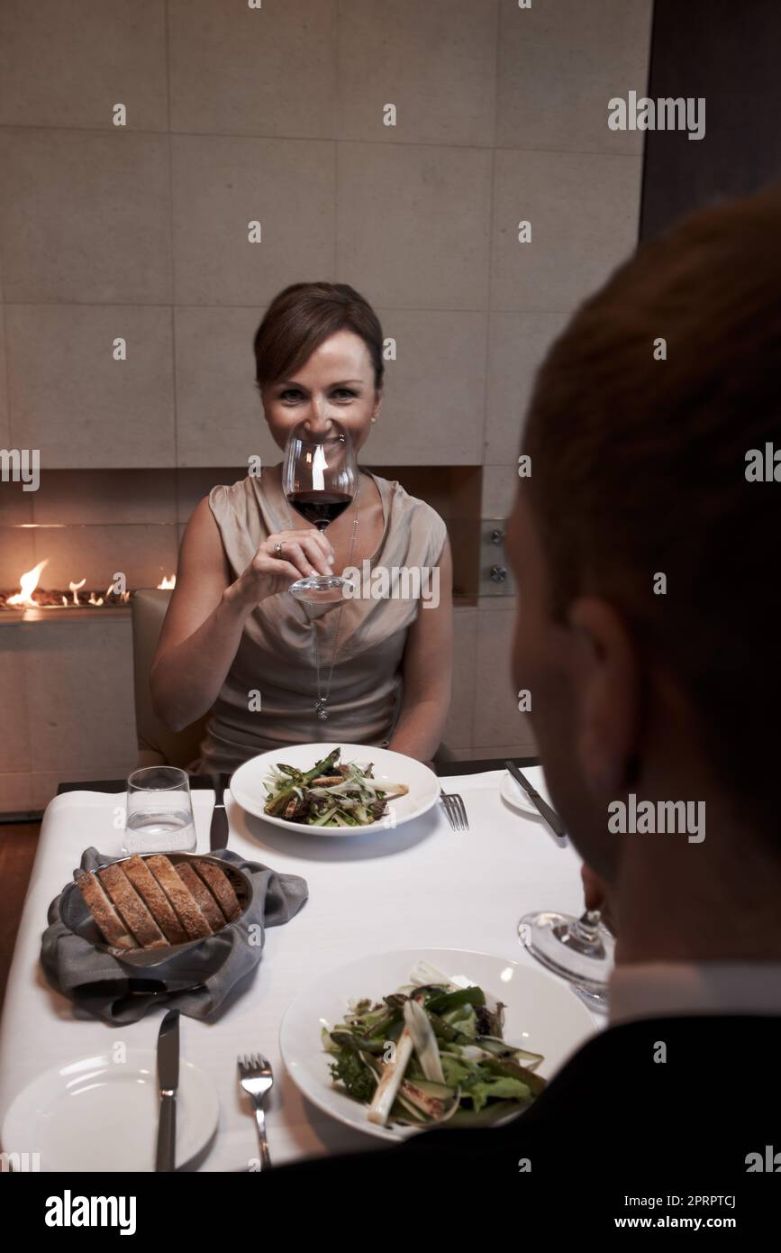 Date night. a couple having dinner in a restaurant Stock Photo - Alamy