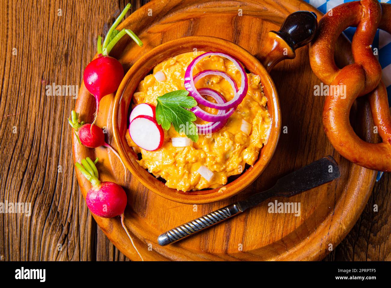 rustic Bavarian obazda with radishes and onions Stock Photo - Alamy