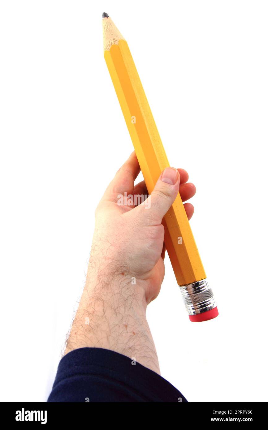 big pencil in human hand isolated on the white background Stock Photo ...