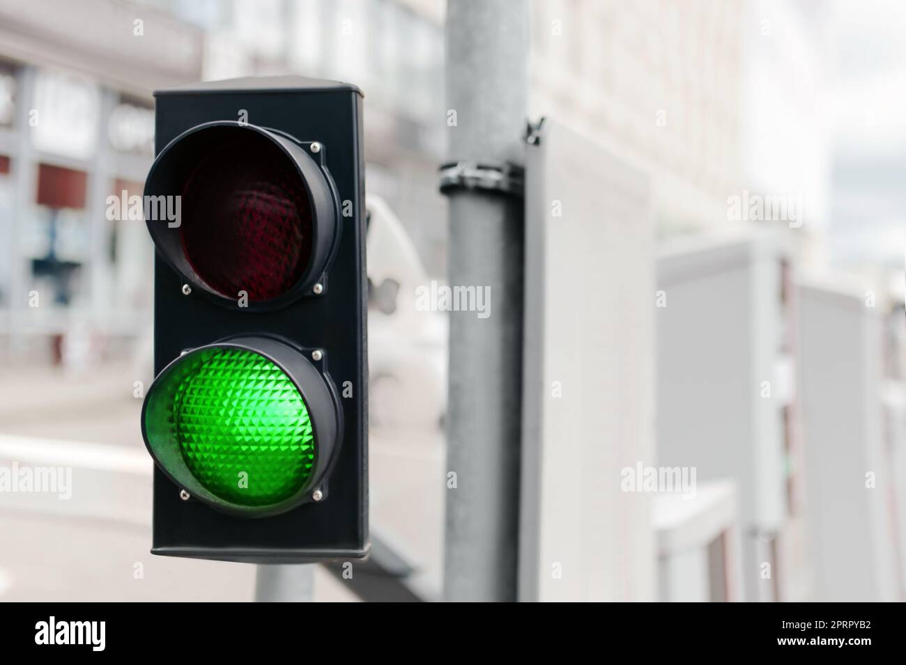 Traffic light on city street, space for text Stock Photo - Alamy