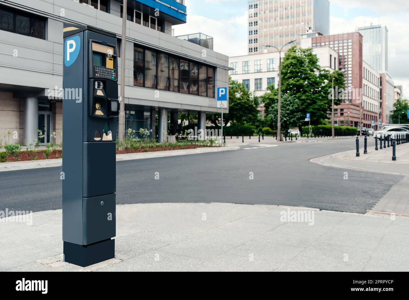 Modern parking meter on city street, space for text Stock Photo - Alamy