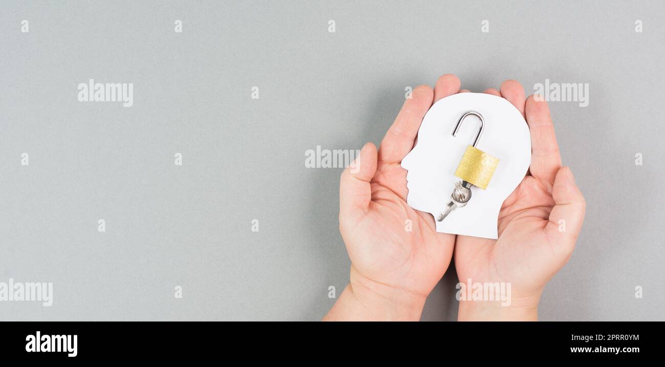 Silhouette of a head with an open lock, free mind, uncontrolled ...