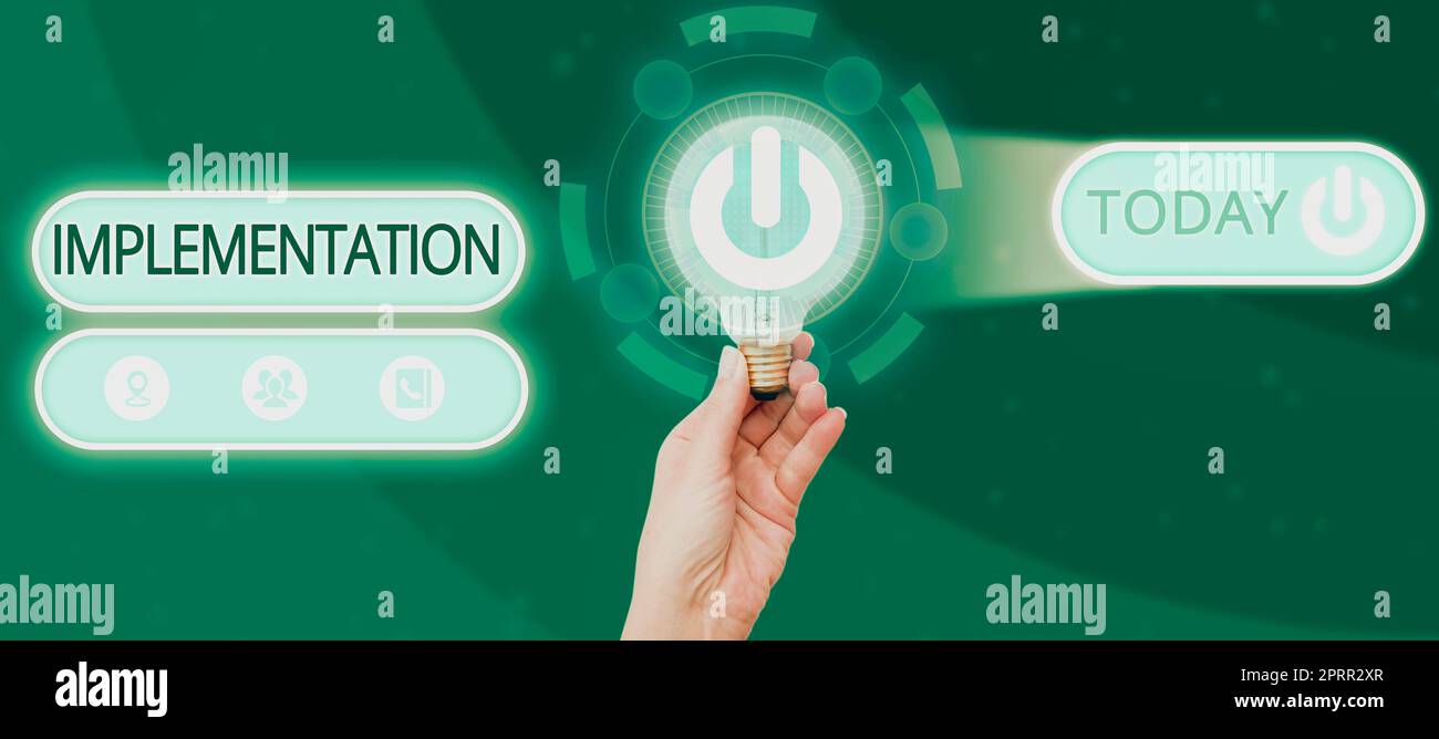 Sign displaying ImplementationThe process of making something active or ...