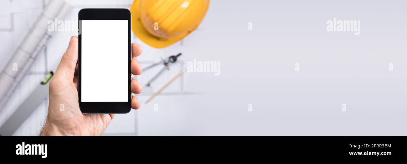 Architecture Contractor With Cell Phone Screen. Hand Holding Smartphone ...