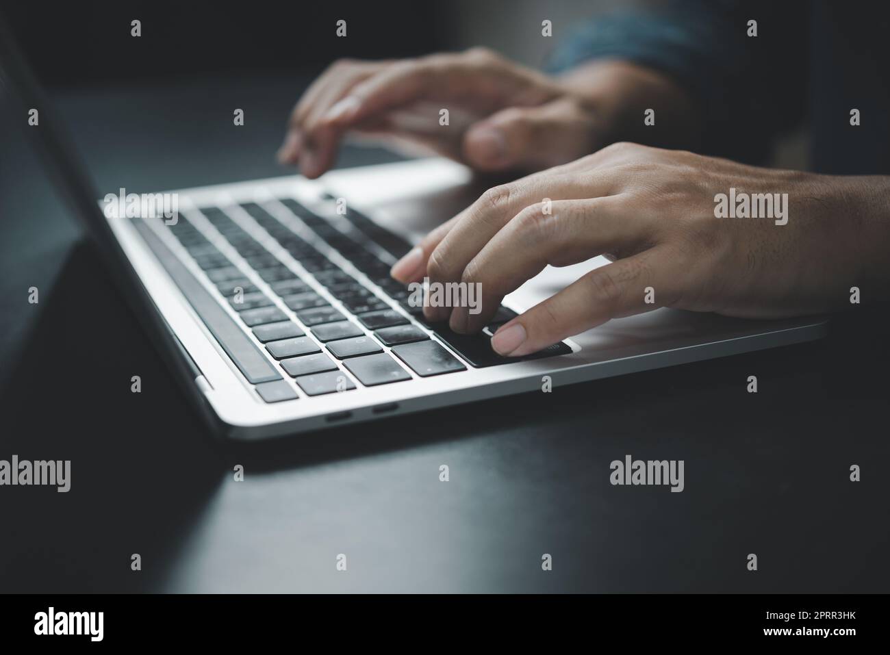 Man using computer laptop working internet searching social media and communications digital ...