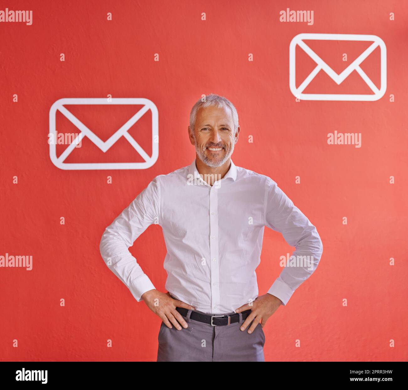 Its all about communication. Portrait of a mature businessman standing ...