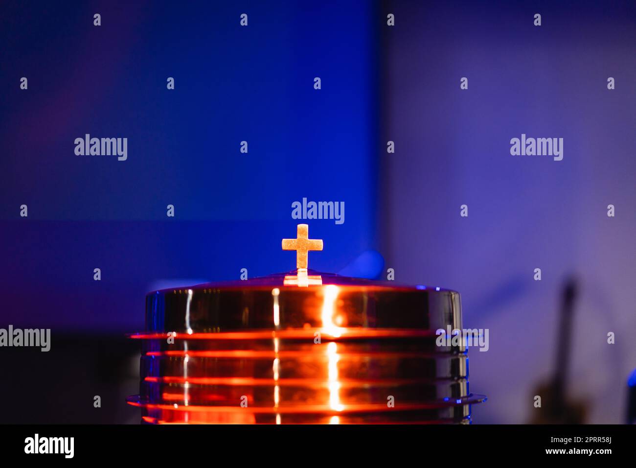 The process of breaking bread in the modern church Stock Photo - Alamy