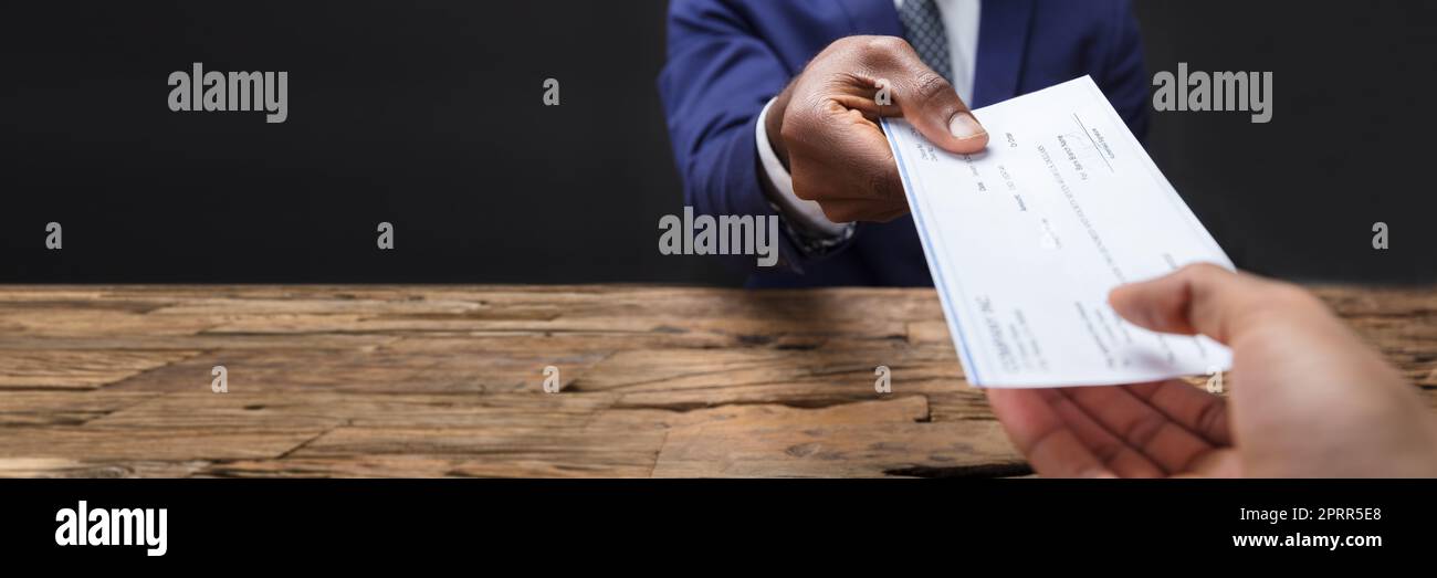 Team holding cheque hi-res stock photography and images - Alamy