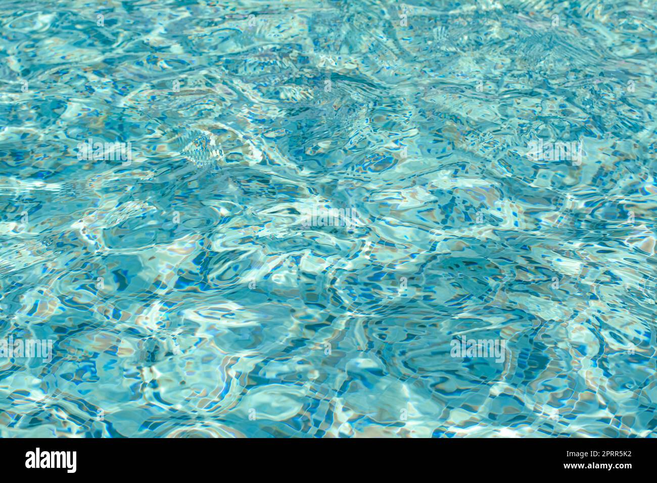 View of cool clear water in swimming pool Stock Photo - Alamy