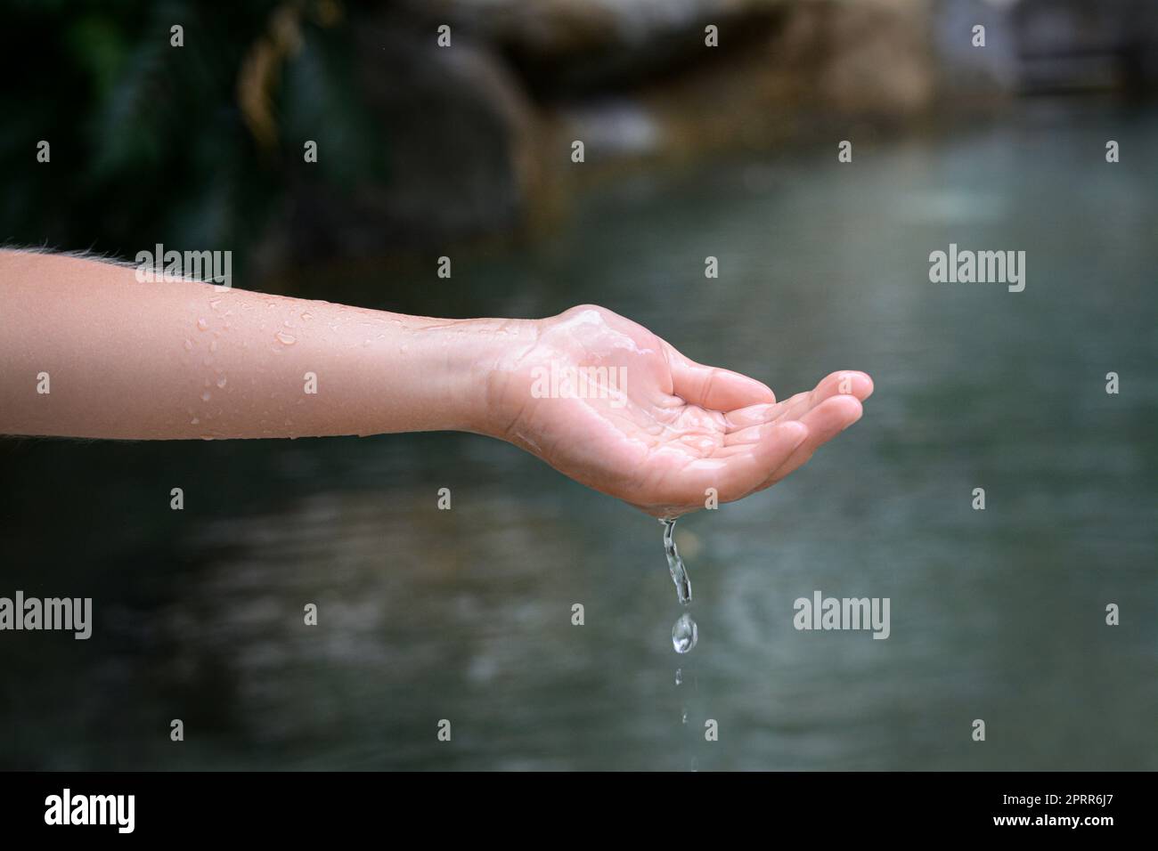 Kid pouring water from hi-res stock photography and images - Alamy