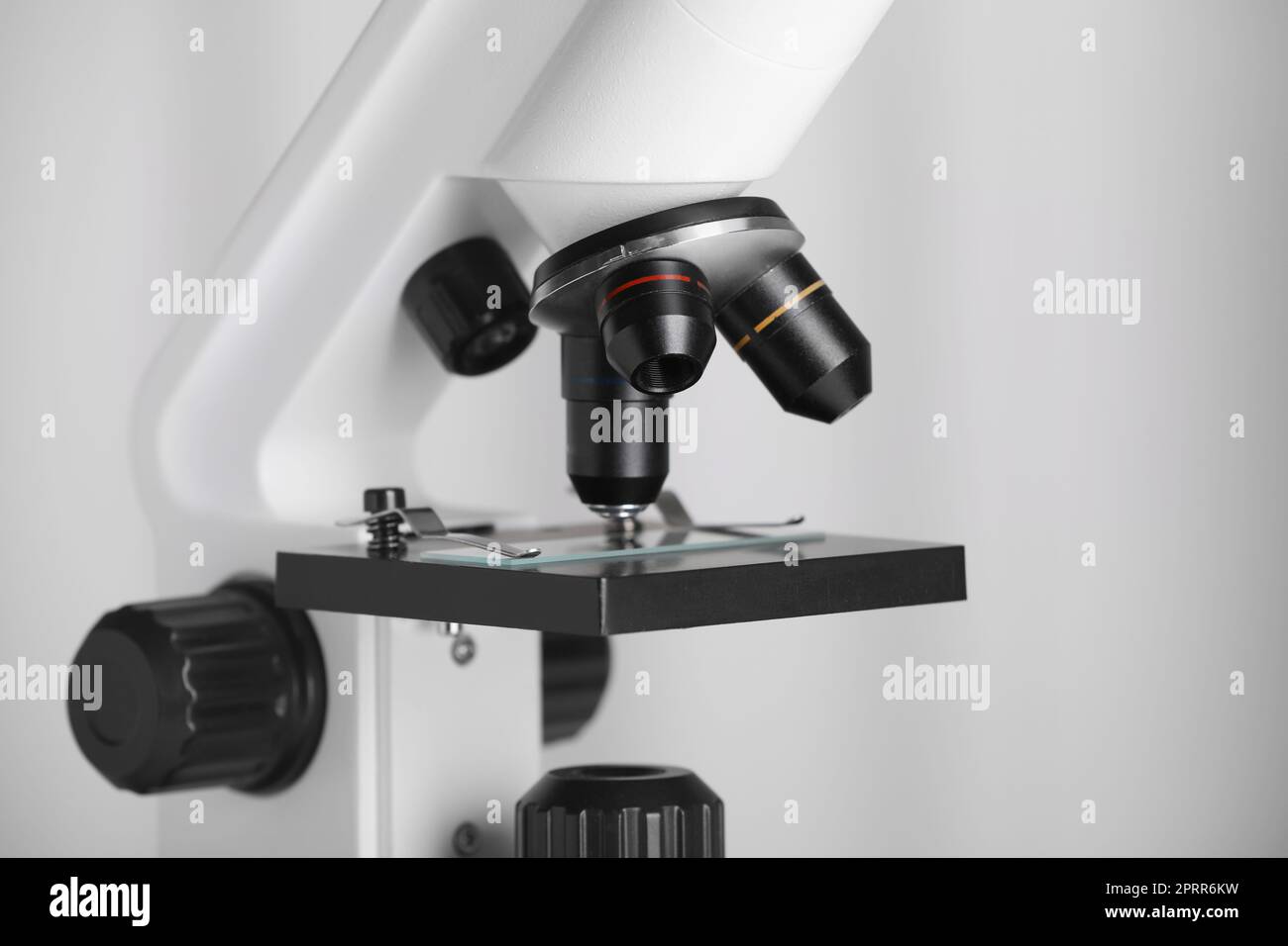 Modern microscope on light background, closeup. Medical equipment Stock ...