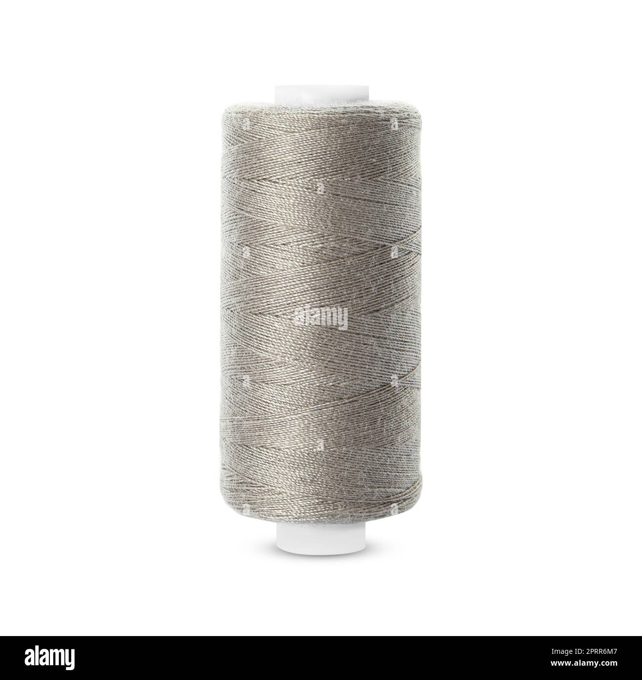 Spool of light grey sewing thread isolated on white Stock Photo - Alamy