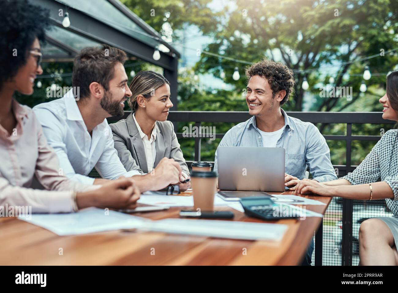 Their bright ideas are all coming together. a group of colleagues ...