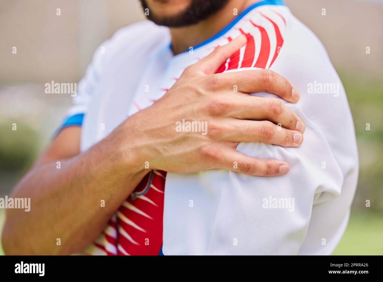 Sports, soccer and hands of man with shoulder pain from training game ...