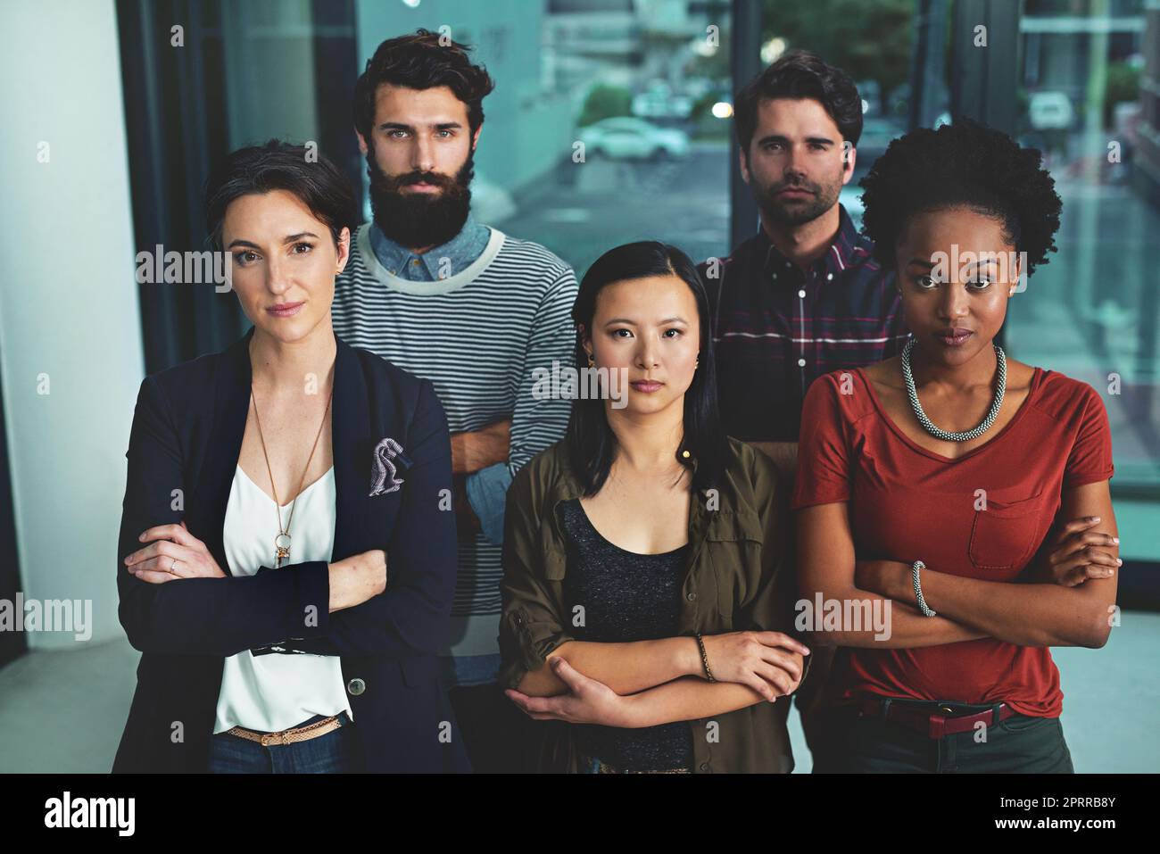 Standing tall as creative pioneers. Portrait of a group of diverse ...