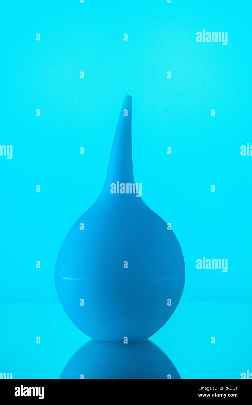 front view squeeze bulb on light blue background Stock Photo - Alamy