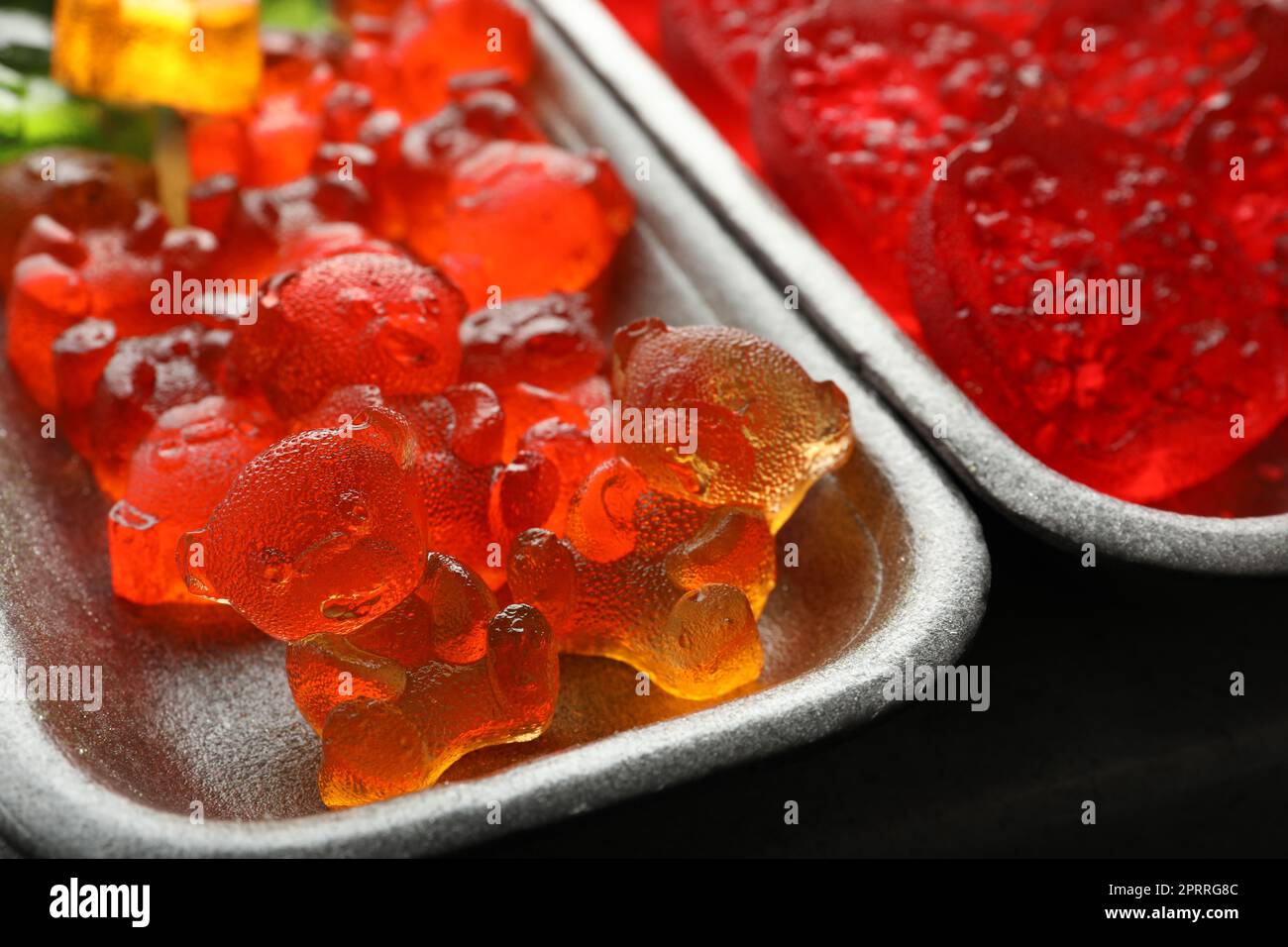 Delicious gummy bear candies in container, closeup Stock Photo - Alamy
