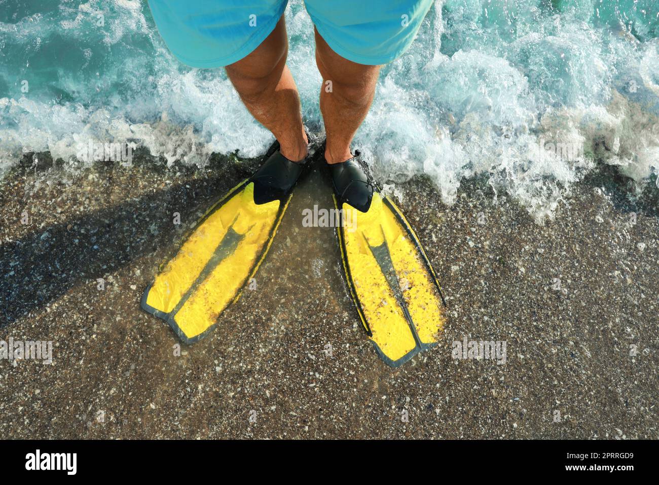 Top view of man in flippers on beach Stock Photo - Alamy