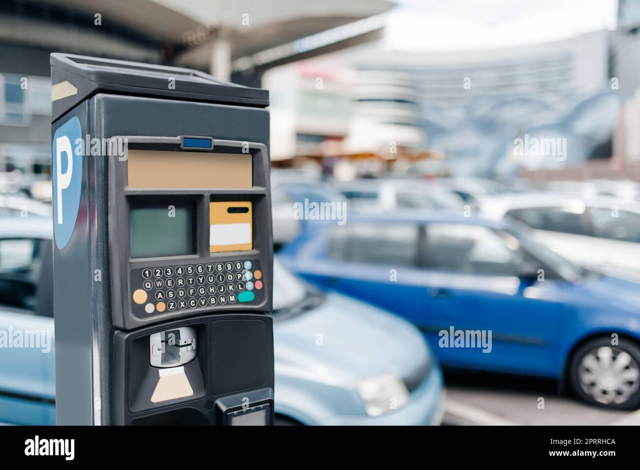 Modern parking meter on city street. Space for text Stock Photo - Alamy