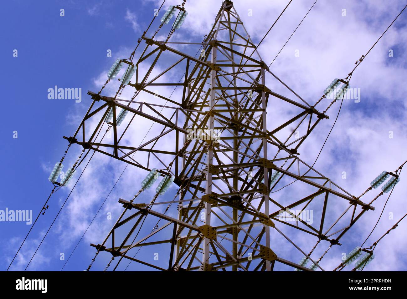 Power plant tower close-up against the blue sky. Energy crisis concept ...