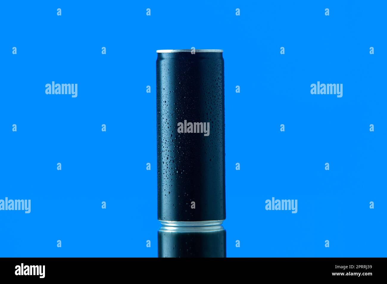 front view black metal drink can with water drops on blue background ...