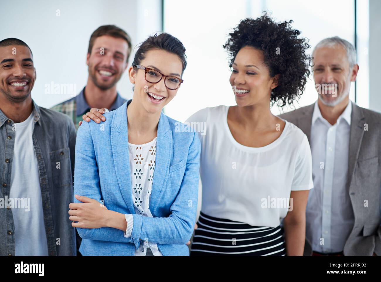 Happy office teamwork hi-res stock photography and images - Alamy