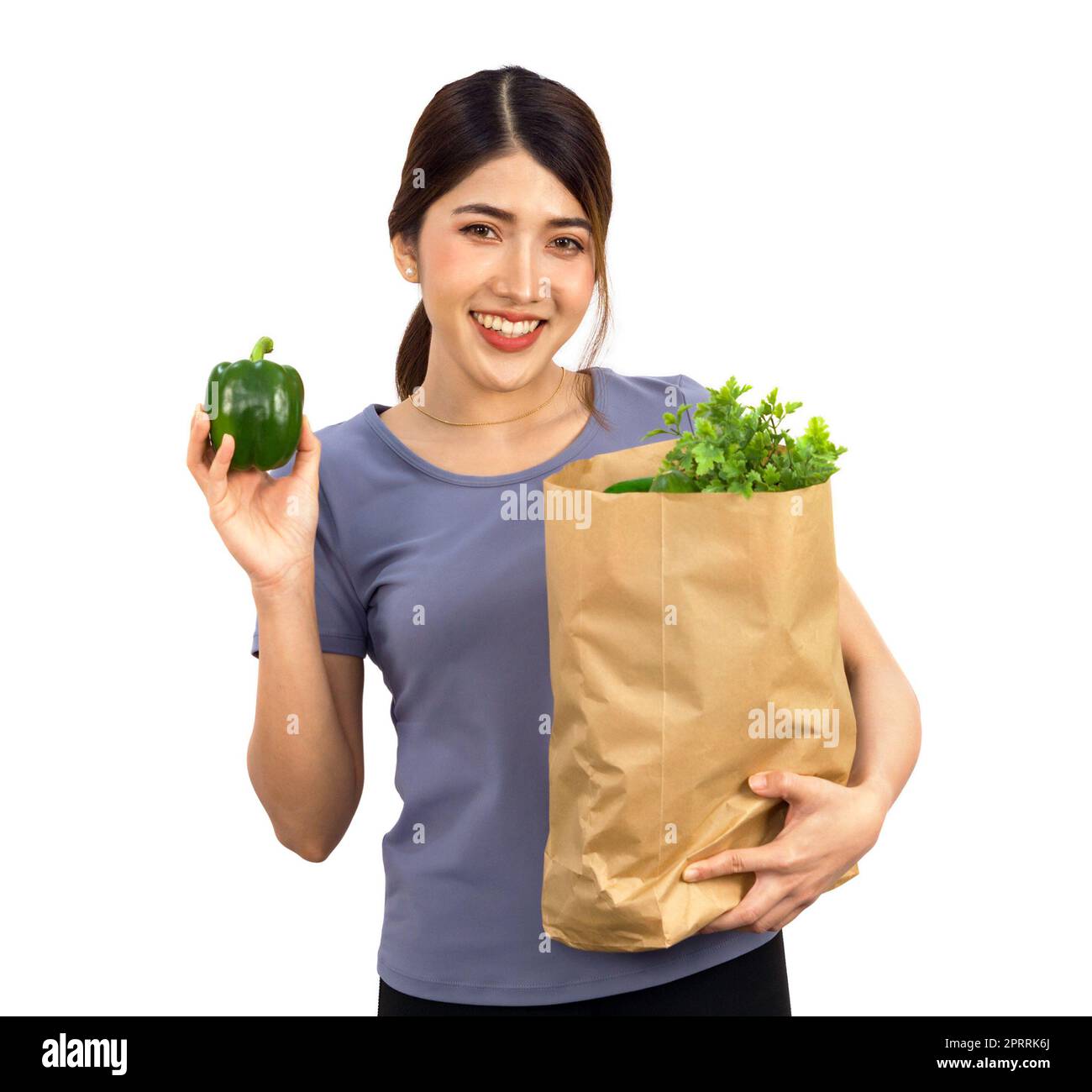 Woman standing on green background hi-res stock photography and images ...