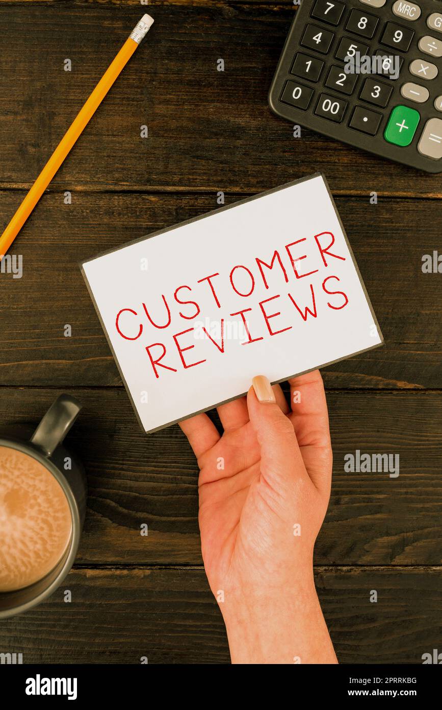 Sign displaying Customer Reviewsreview of product or service made by ...