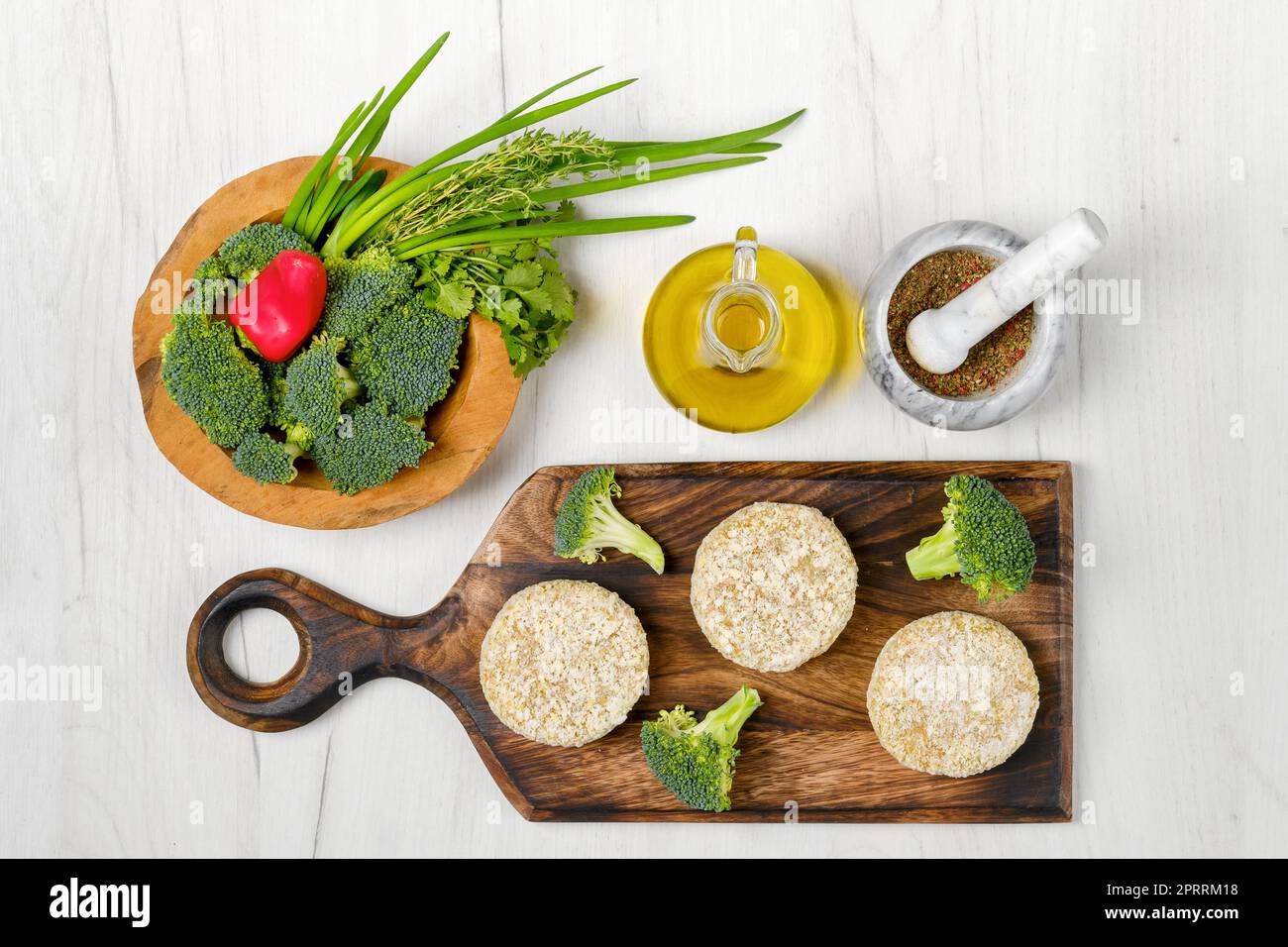 Top view of semifinished homemade chicken cutlet with broccoli Stock ...