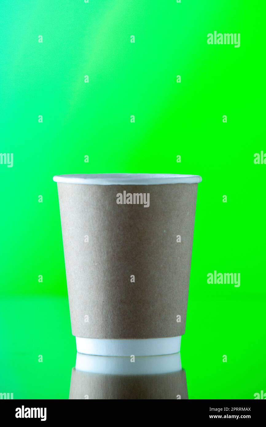 front view grey paper water cup on light green background stock photo ...