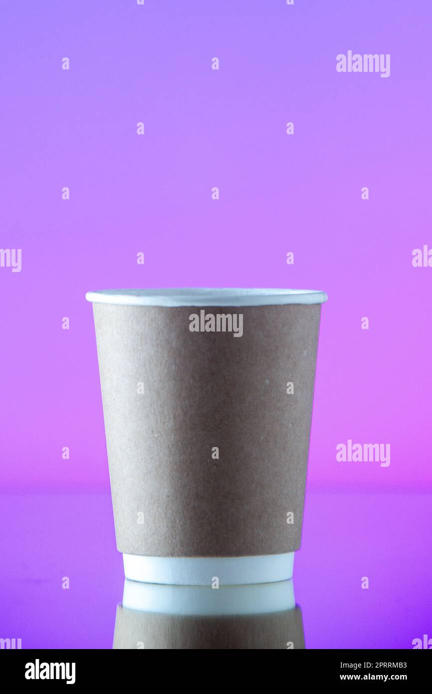 front view grey paper water cup on light purple background stock photo ...