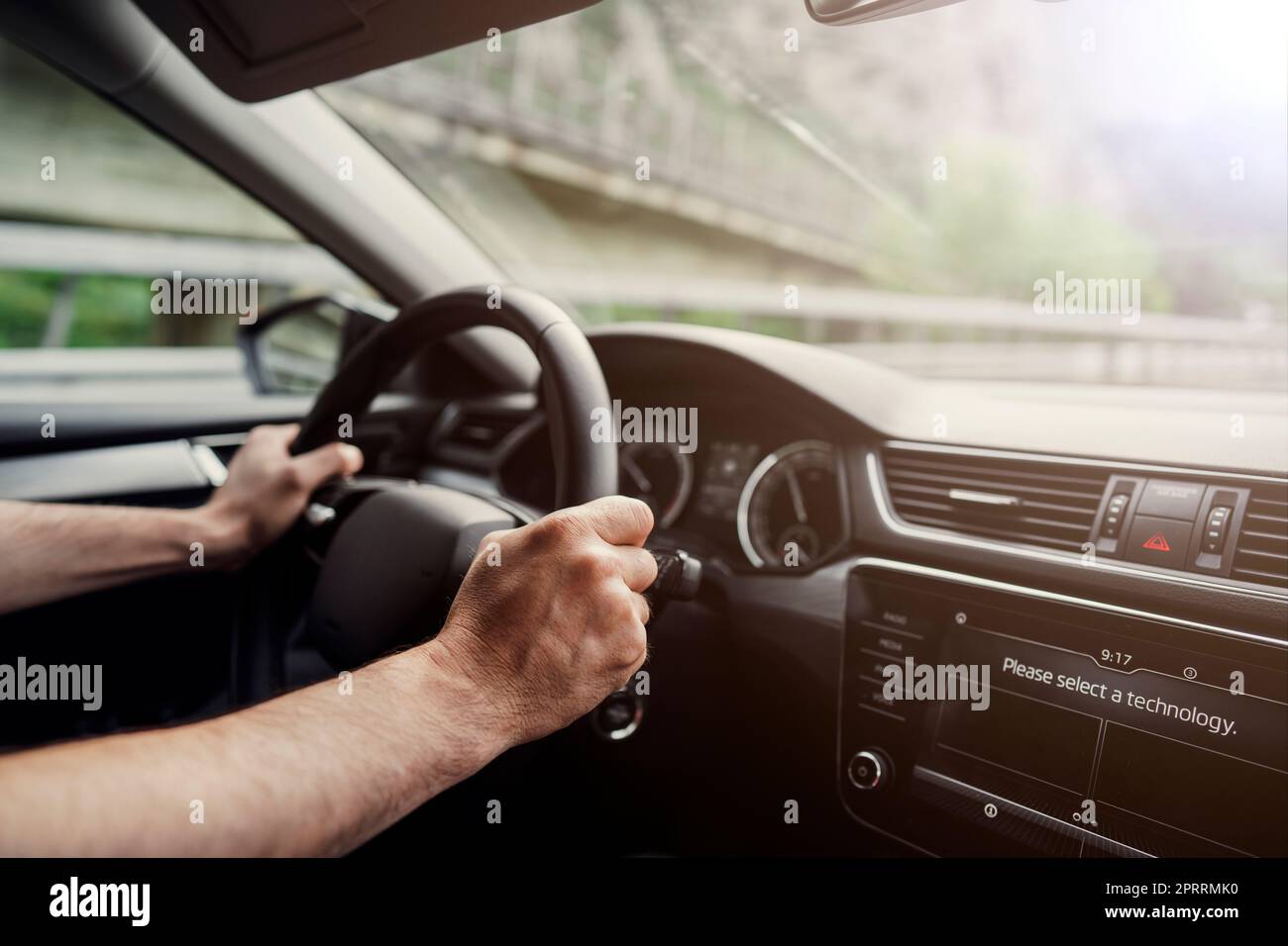 Arm on steering wheel hi-res stock photography and images - Alamy